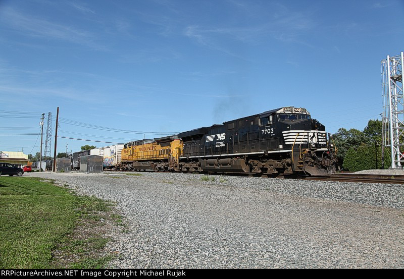 NS 7703